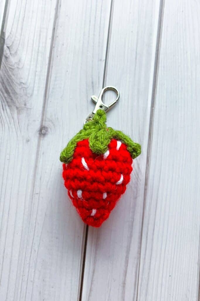 Crochet Strawberry Keychain Pattern - thecaffeinatedsnail.com