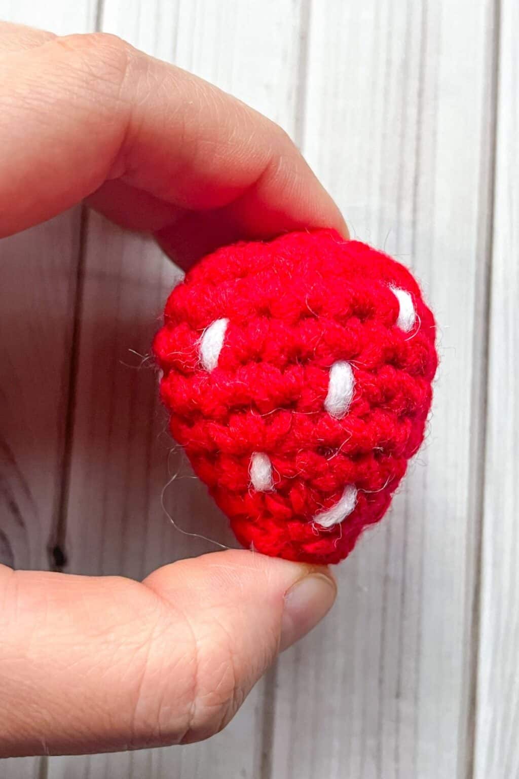 Crochet Strawberry Keychain Pattern - thecaffeinatedsnail.com