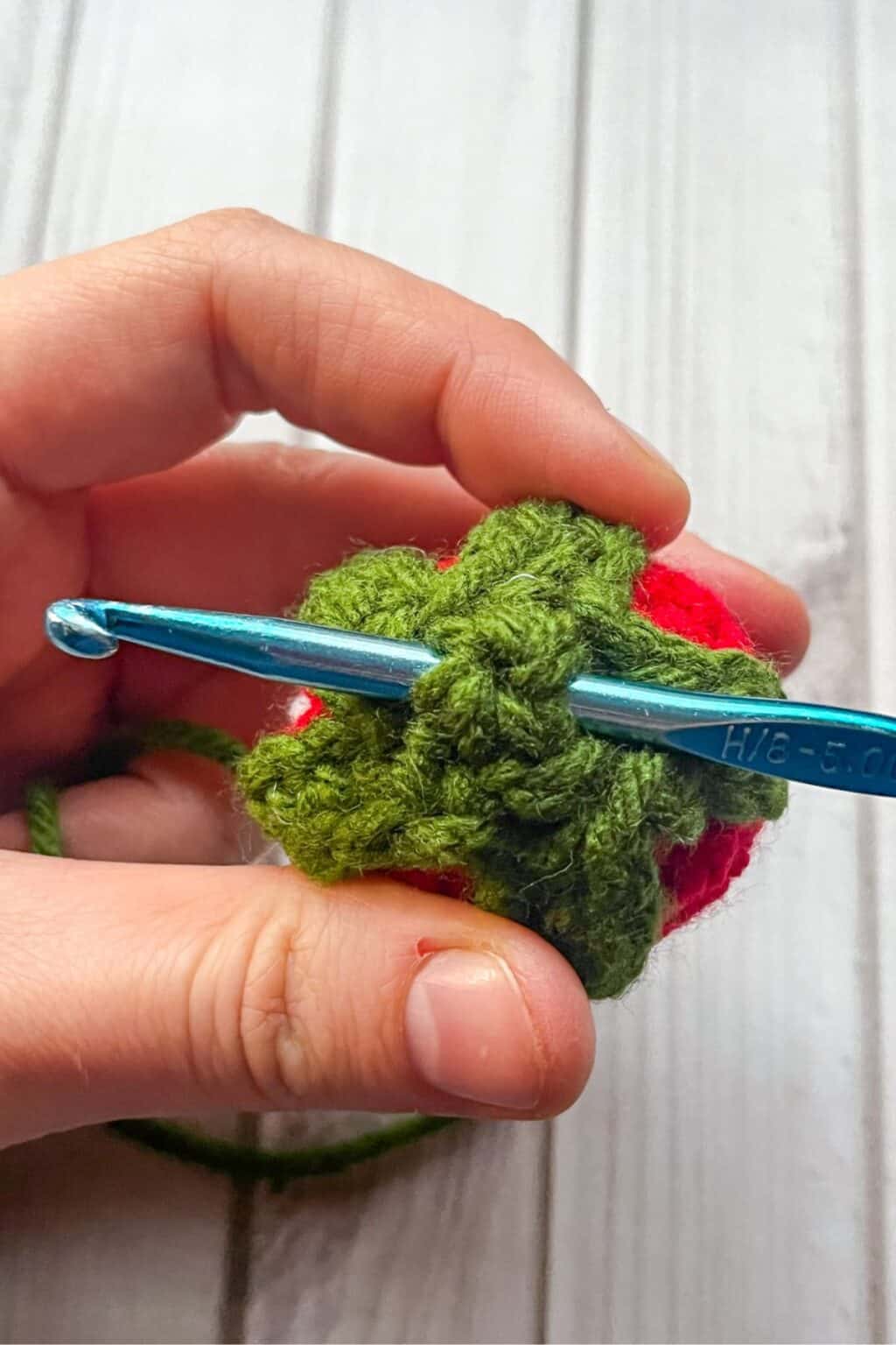 Crochet Strawberry Keychain Pattern - thecaffeinatedsnail.com