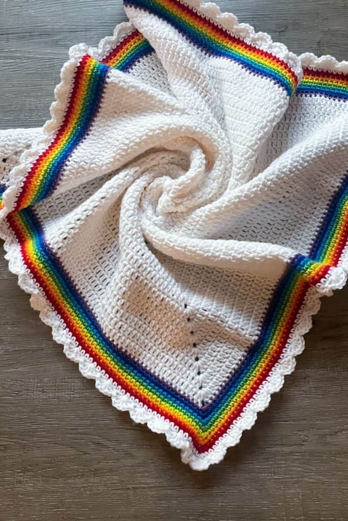Crochet Rainbow Baby Blanket Pattern - thecaffeinatedsnail.com