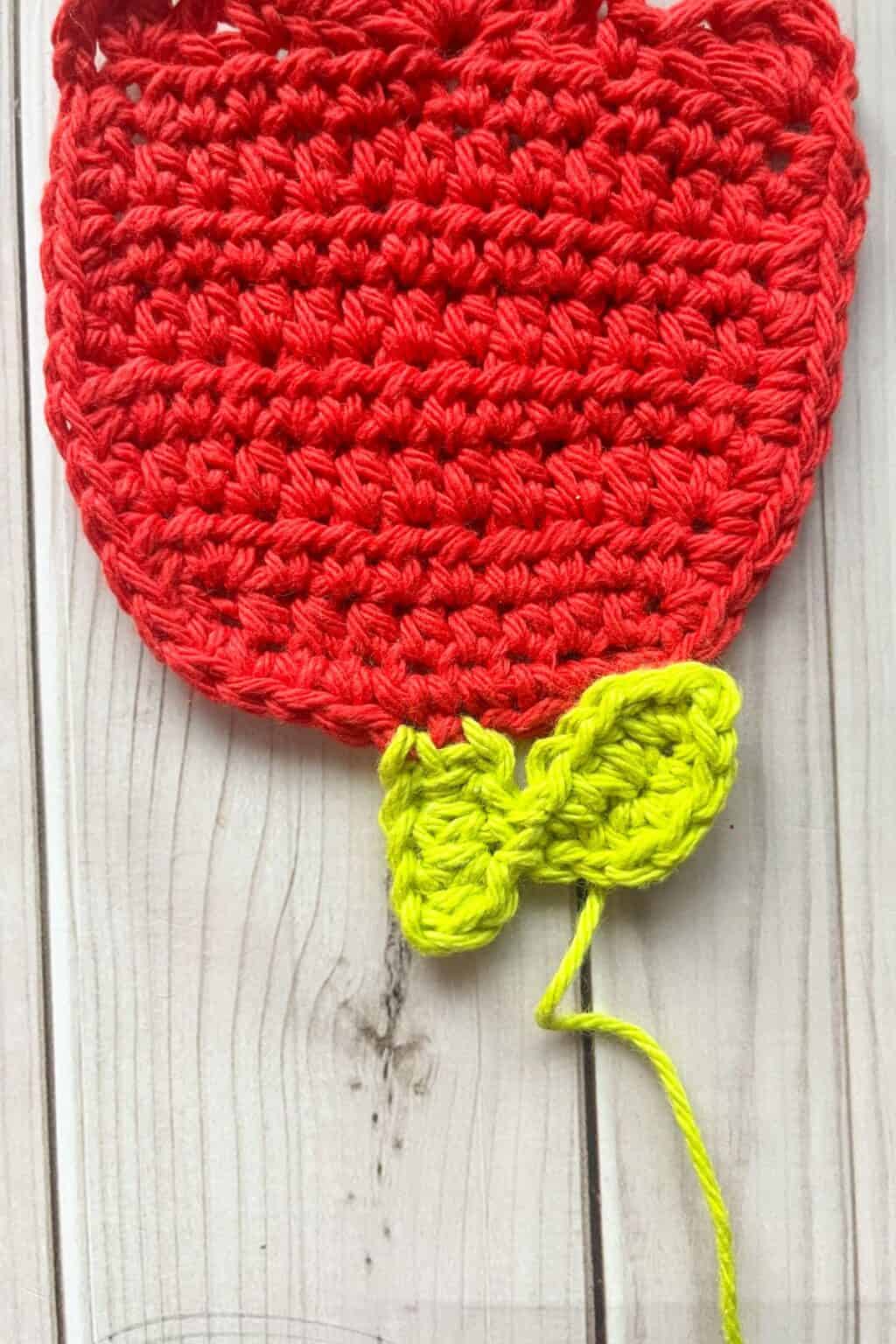 Crochet Tulip Coaster Pattern - thecaffeinatedsnail.com
