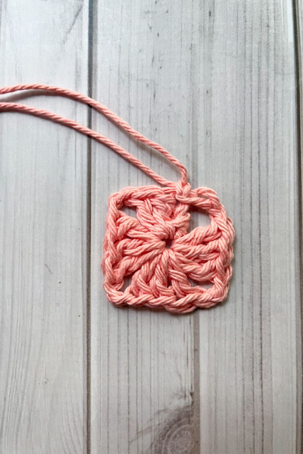 Crochet Granny Square Coaster Pattern - thecaffeinatedsnail.com